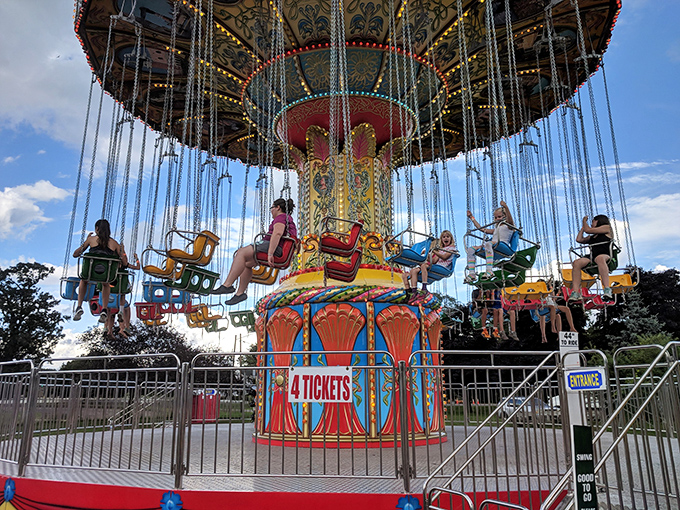 The county fair swing ride spins stories of childhood summers, cotton candy fingers, and the universal joy of momentary flight.