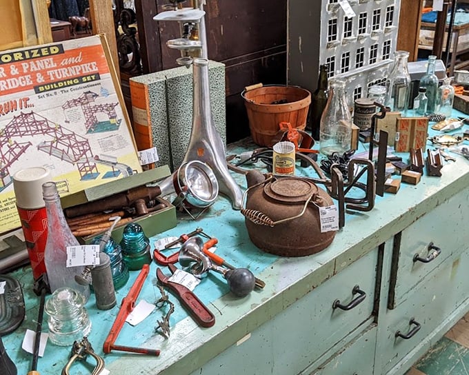 A treasure trove of tools and curiosities spread across a mint-green dresser. That cast iron teapot has probably brewed enough tea to fill Portland's Willamette River.