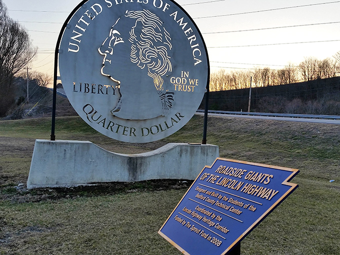 Dusk settles over the Lincoln Highway as the Giant Quarter stands watch. Some landmarks simply refuse to fade into the background.