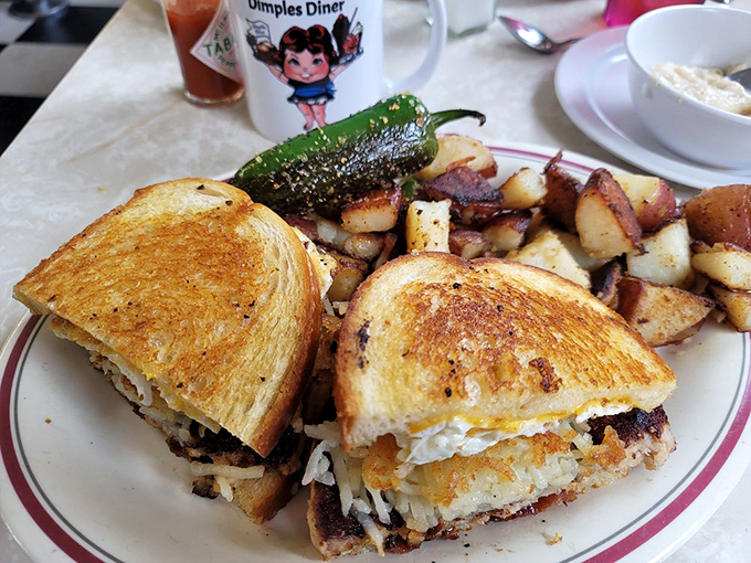 The sandwich that answers the eternal question: "Why choose between breakfast and lunch when you can have both between two perfectly toasted slices?"