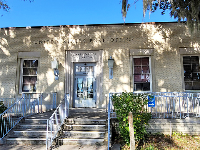 The stately Lake Wales Post Office, where sending mail becomes a civic experience. Those shadow-dappled steps have witnessed countless community stories since the town's early days. 