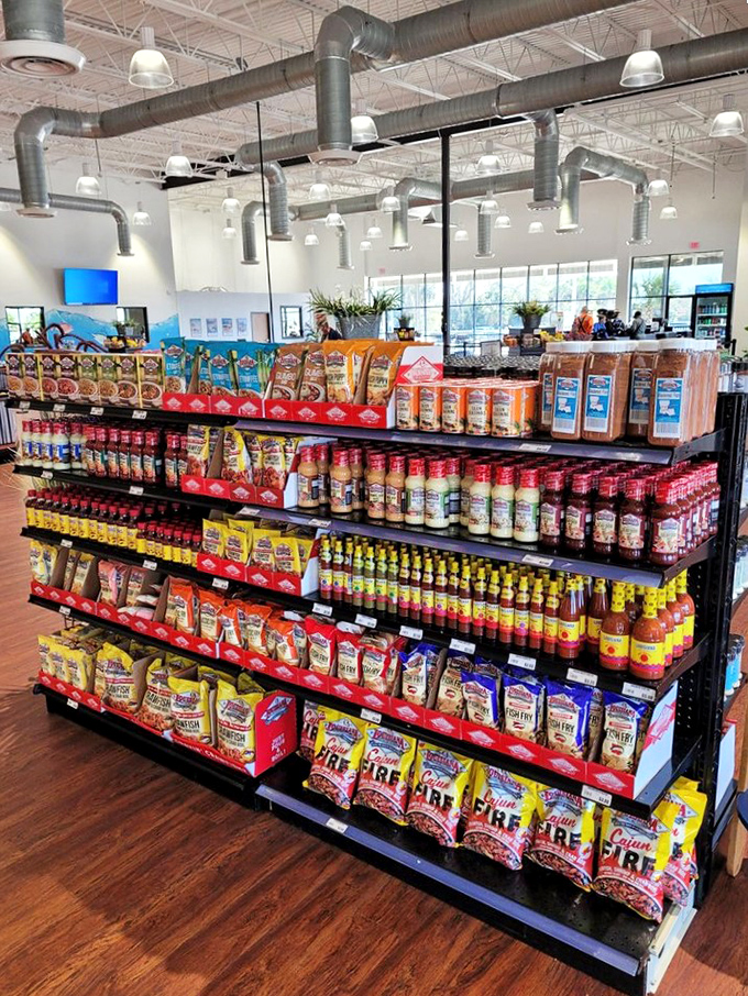 Grocery aisles stocked with coastal essentials&mdash;the kind of place where you come for lunch and leave with bags of seafood seasonings and sauces.