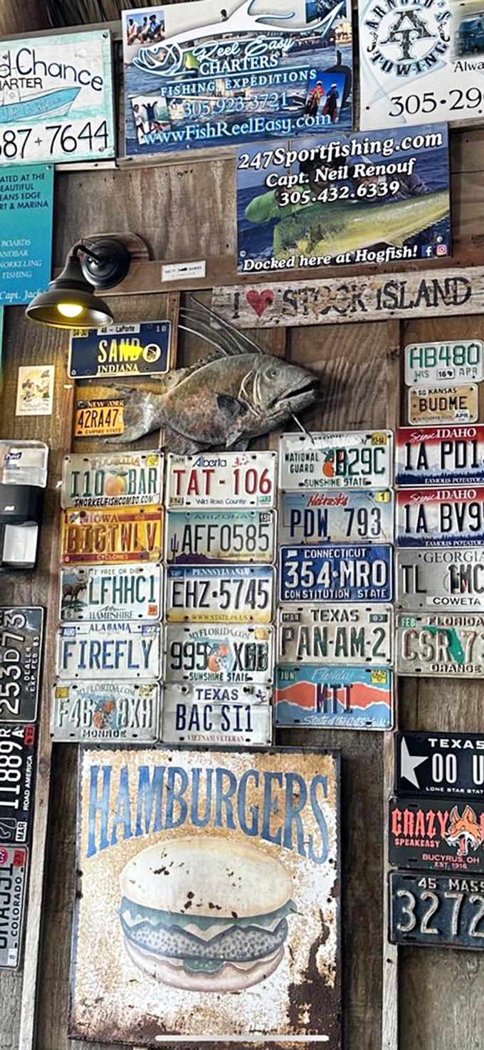 License plates from across America tell the story&mdash;people come from everywhere, leaving a piece of home on walls that welcome all.