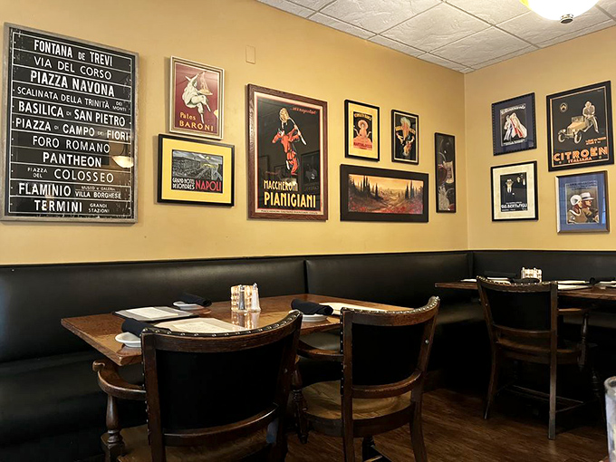 Vintage Italian posters and Roman street signs adorn the walls, adding character without trying too hard to impress anyone.