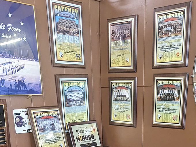 The wall of local sports memorabilia tells you everything&mdash;this isn't just a restaurant; it's a community gathering place where victories are celebrated.