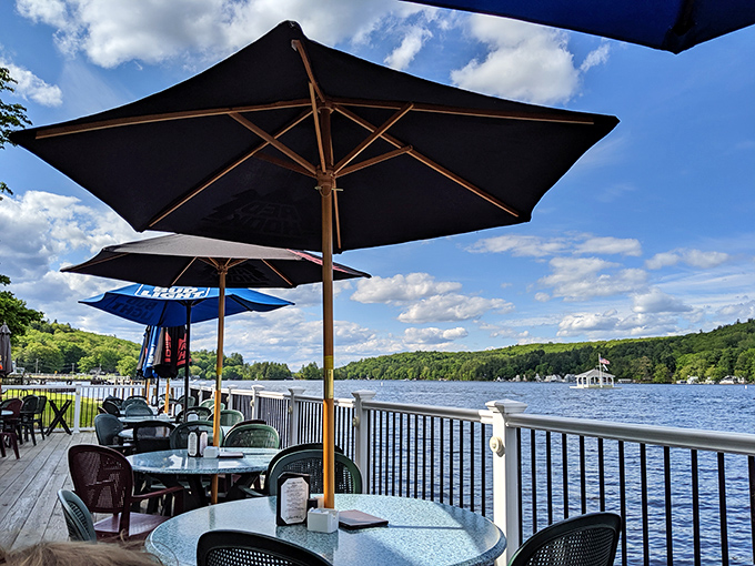 Umbrella-shaded tables overlooking Lake Winnipesaukee&mdash;because great views and great food are a pairing that never goes out of style.