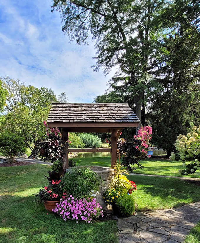 Wishing wells have never looked this enchanting. This flower-draped structure seems plucked from a storybook, promising magic to all who visit.