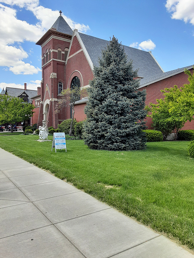 Zion Lutheran Church's striking red brick architecture reaches skyward, a spiritual anchor in the community since long before smartphones existed.