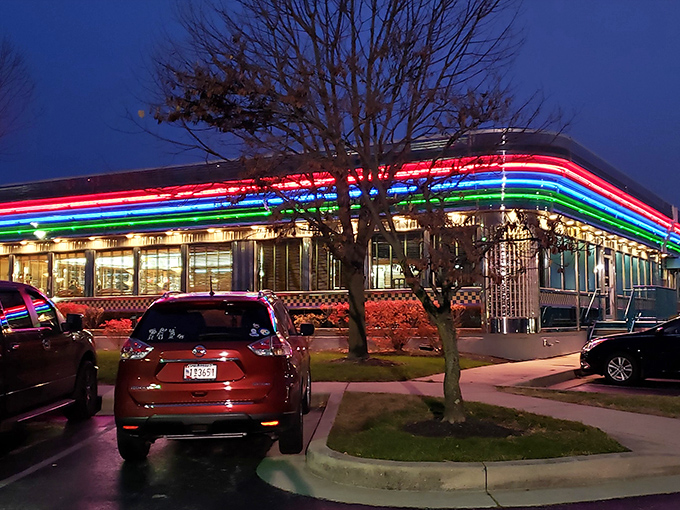 As night falls, Boulevard Diner's neon trim transforms into a multicolored beacon of hospitality, promising late-night comfort to hungry night owls.