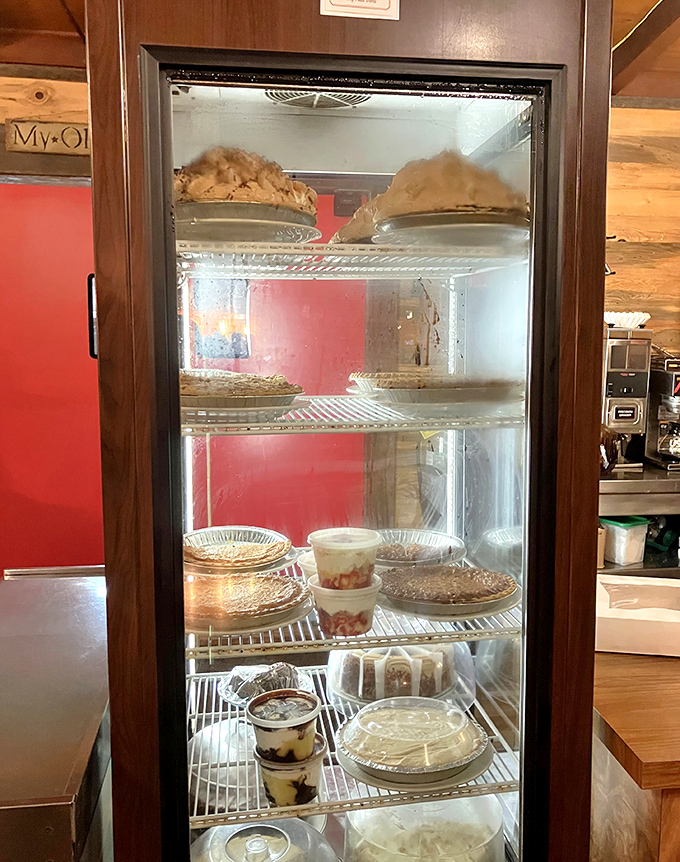 The dessert case &ndash; a glass-fronted temple of temptation where pies, cakes, and puddings compete for your affection. Choose wisely, or just get one of each.
