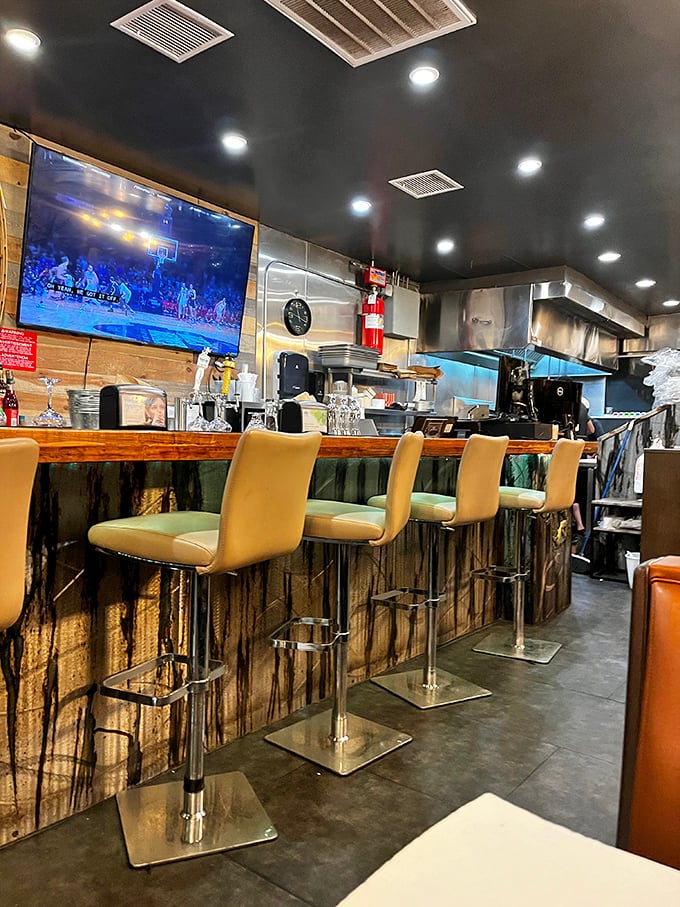 The bar area combines rustic charm with nautical touches&mdash;like if a fishing boat and a mountain cabin had a stylish restaurant baby.