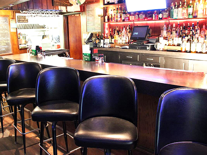 The bar stands ready for serious business &ndash; no flashy mixology tricks needed when quality spirits and friendly conversation are the true ingredients.