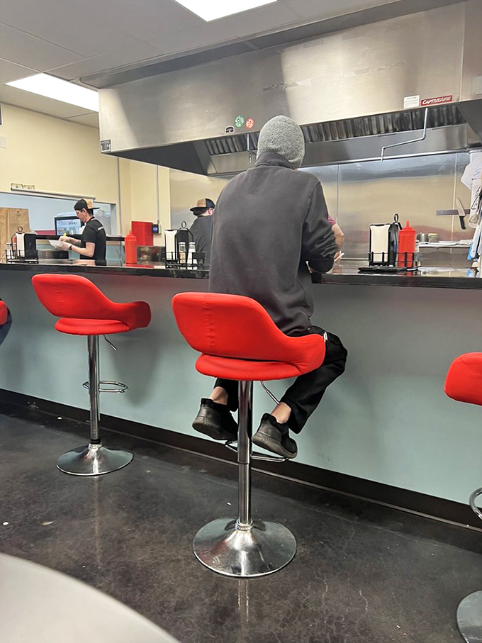 Those red stools aren't just comfortable&mdash;they're time machines to when food was honest and calories didn't count if you were having fun.