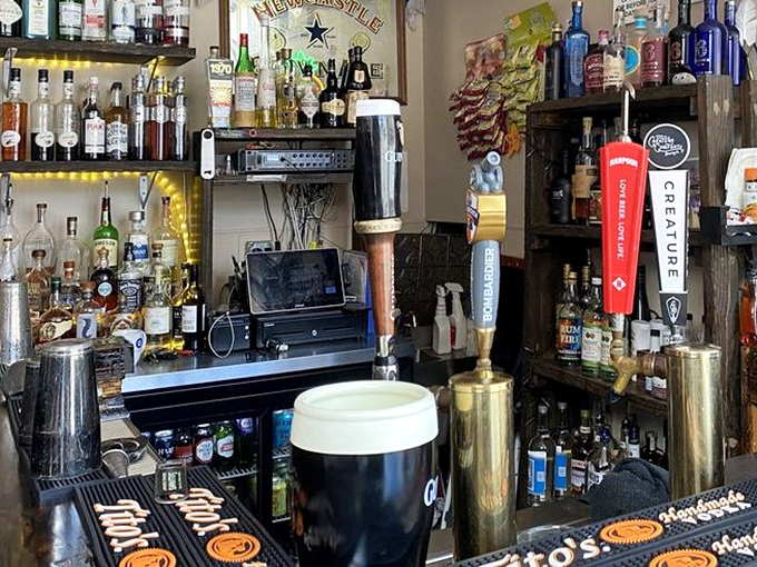 Not just a bar, but a cultural embassy where Guinness diplomats negotiate peaceful relations with local craft brews.