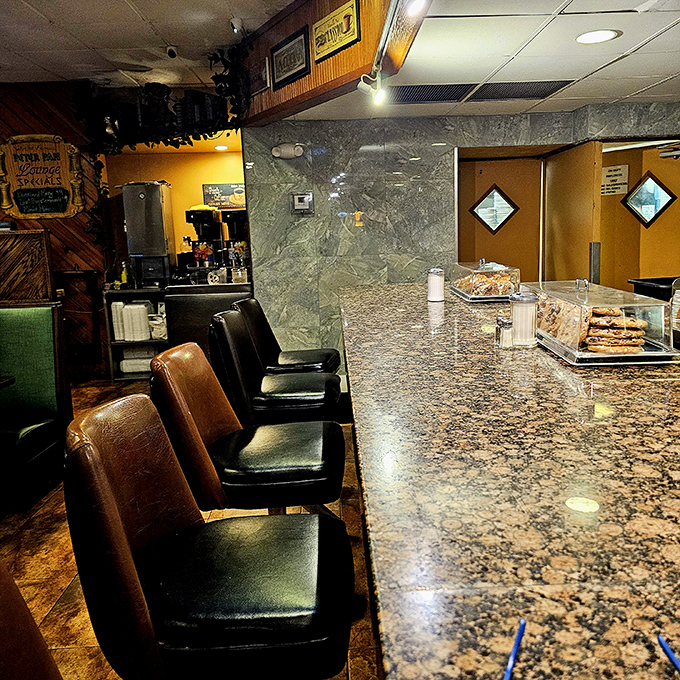 The counter seating&mdash;where solo diners become temporary neighbors and the marble-topped bar has witnessed more coffee refills than a barista's wildest dreams.
