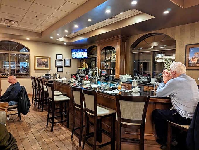 The bar at Joe's &ndash; where strangers become friends and regulars are treated like royalty. Polished wood and good conversation flow freely.