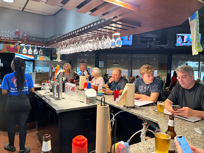 The bar area &ndash; where strangers become friends over cold drinks and hot seafood, sharing stories that get better with each retelling.