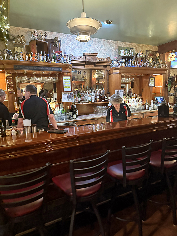 The bar area, where stories flow as freely as the drinks, and every bottle seems to hold not just spirits but memories.