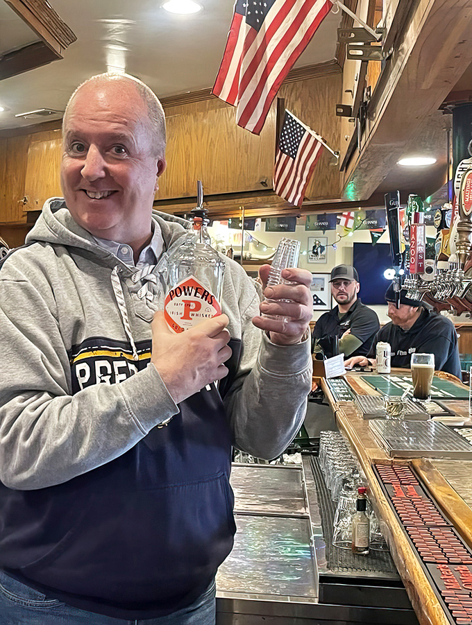 The joy of a proper pour is written all over this patron's face&mdash;some moments of pure happiness can only be found at the right bar.