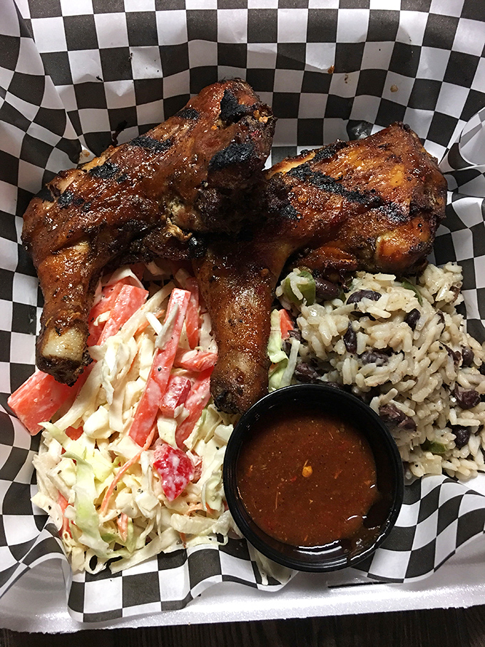 Barbecue chicken that's been slow-smoked until it reaches that perfect mahogany color, served with sides that refuse to be overshadowed by the main attraction.