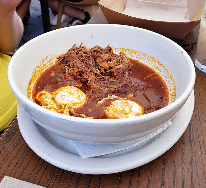 The brisket breakfast bowl—where 14-hour slow-roasted beef meets perfectly poached eggs in a marriage so beautiful it deserves its own reality show.