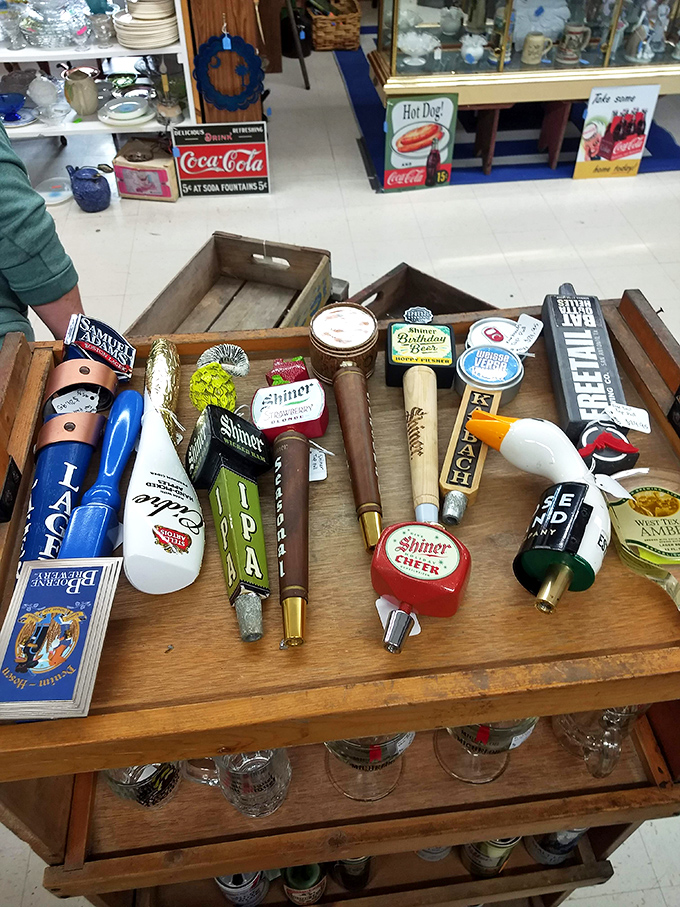 Beer tap handles that poured countless celebrations, now retired from bar duty but still ready to tell tales of toasts long forgotten.