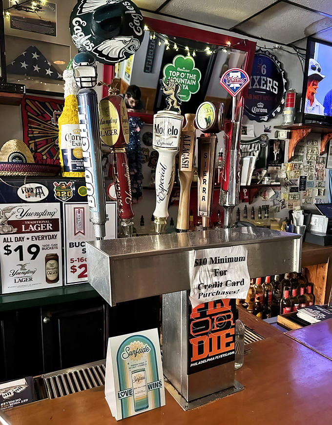 Beer taps standing at attention like loyal soldiers, ready to serve the perfect companion to Philadelphia's finest roast beef.