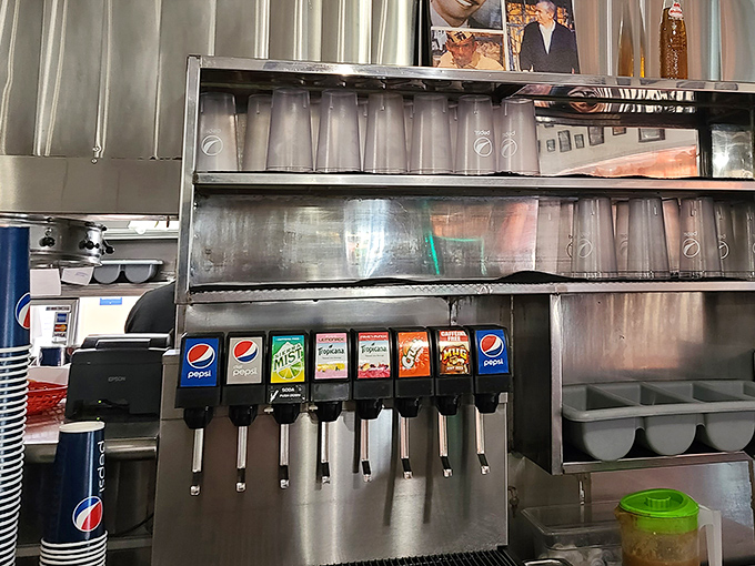 The soda fountain – where decisions about which sugary companion will join your spicy feast become surprisingly philosophical.