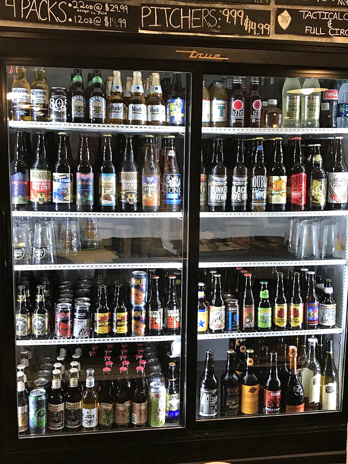 The beer selection rivals many dedicated taprooms, with local craft options and imports standing at attention, ready to complement your tubular meat adventure.