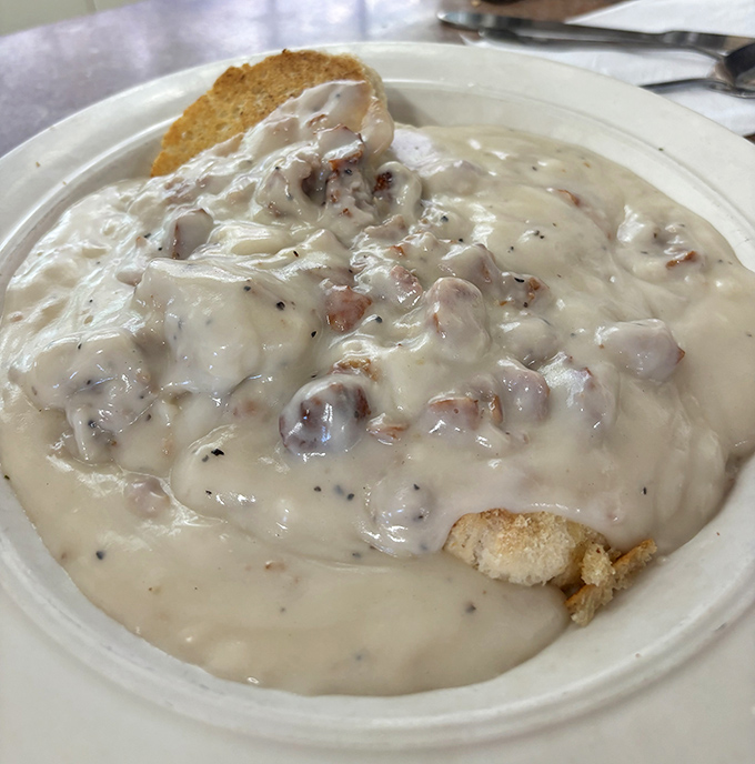 Biscuits swimming in creamy gravy&mdash;comfort food so authentic it could make a Southerner nod in approval while reaching for a second helping.