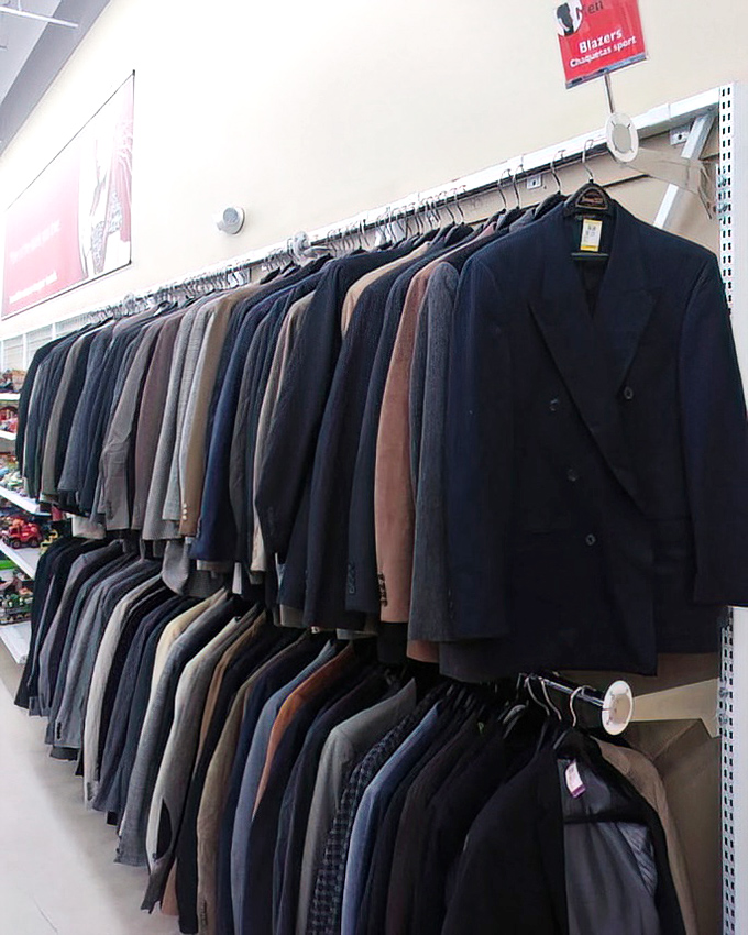 Men's blazers stand at attention like a well-dressed army, ready to transform job interviews, first dates, and special occasions on a budget.