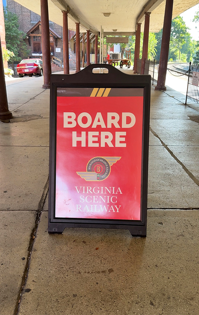 "Board Here"—two simple words that promise several hours of what modern life rarely offers: permission to simply sit and watch the world go by.