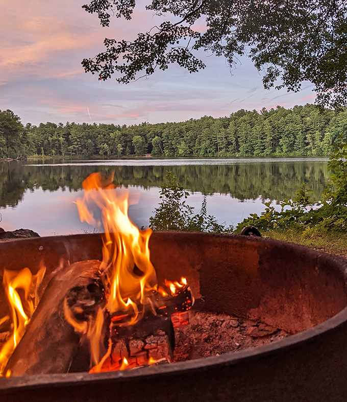 Campfire views across the pond at dusk explain why humans invented camping in the first place millennia ago.