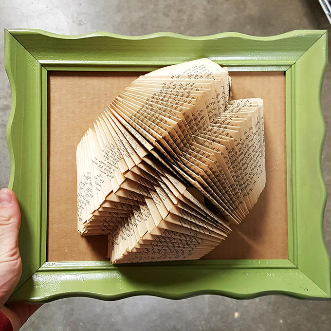 Someone turned book pages into actual art, and now it's waiting here for you to discover at thrift store prices.