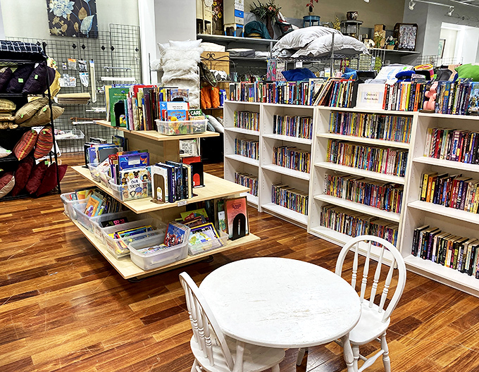 The book section feels like a library where every volume can come home with you. That little reading nook invites you to sample before you commit.