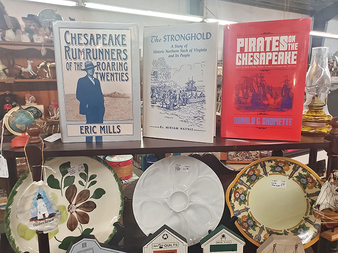 Local history bound in hardcover sits alongside decorative plates. Virginia's colorful past&mdash;from Prohibition rum-runners to Chesapeake pirates&mdash;preserved for curious minds.