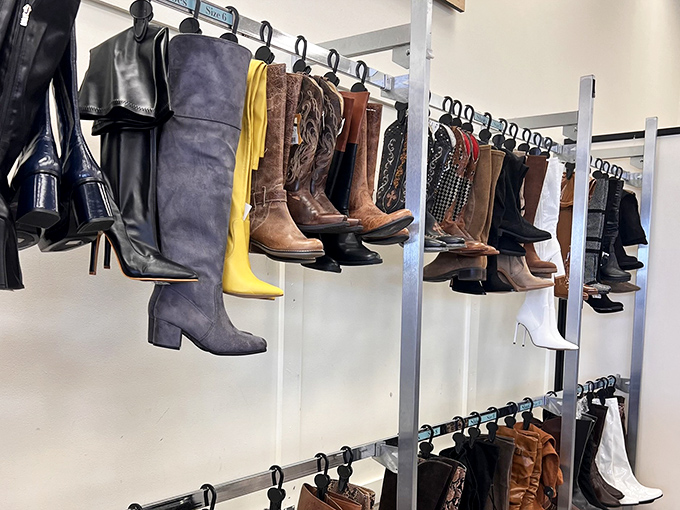 Boot boulevard! This hanging display of footwear ranges from practical to statement-making, with that yellow pair boldly asking, "Why so serious?"