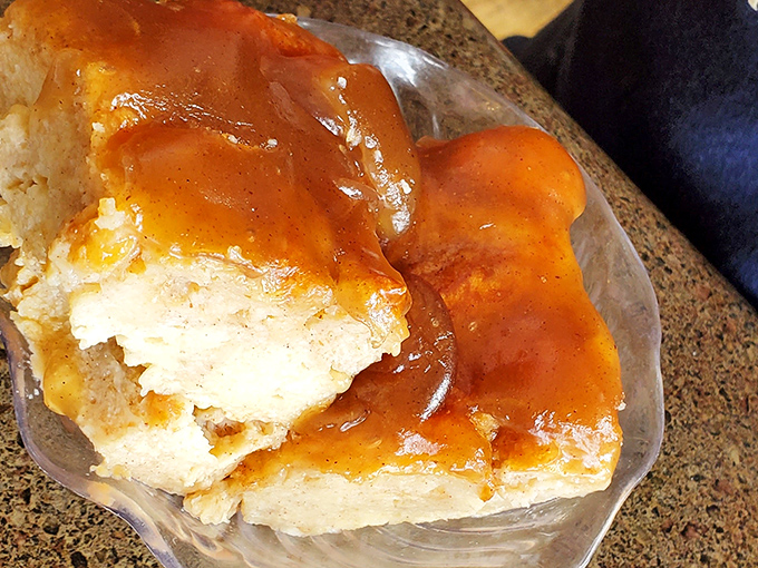 Bread pudding that doesn't just hug your taste buds—it throws them a full-on celebration with caramel sauce as the guest of honor.