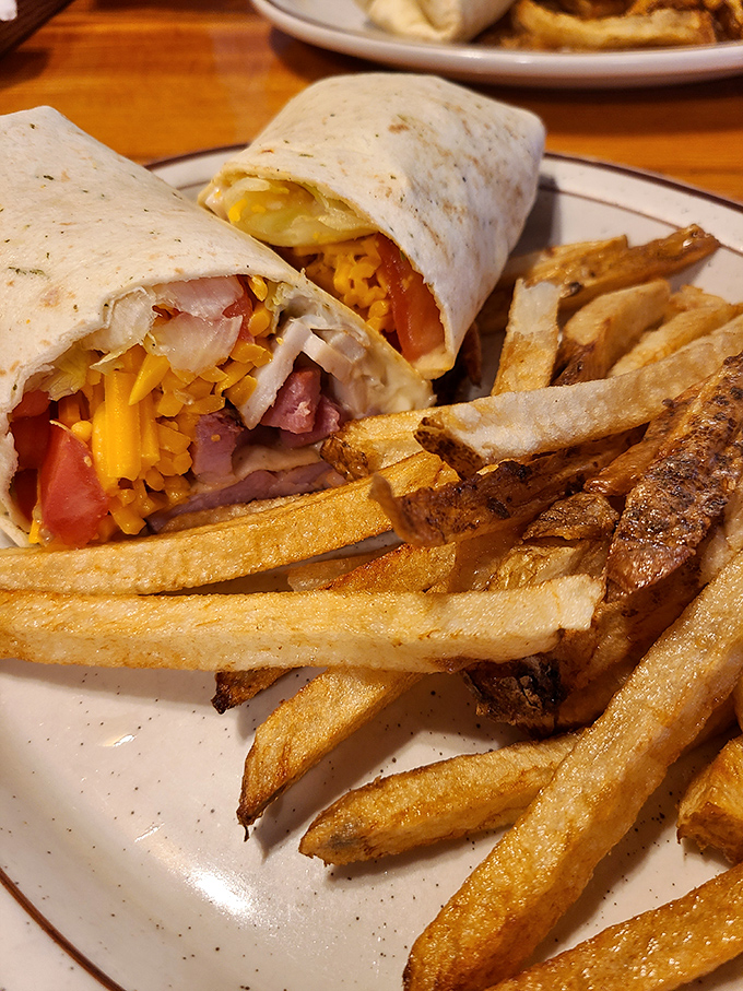 This breakfast wrap doesn't just contain ingredients &ndash; it embraces them in a warm tortilla hug alongside those hand-cut fries that shame their frozen cousins. 