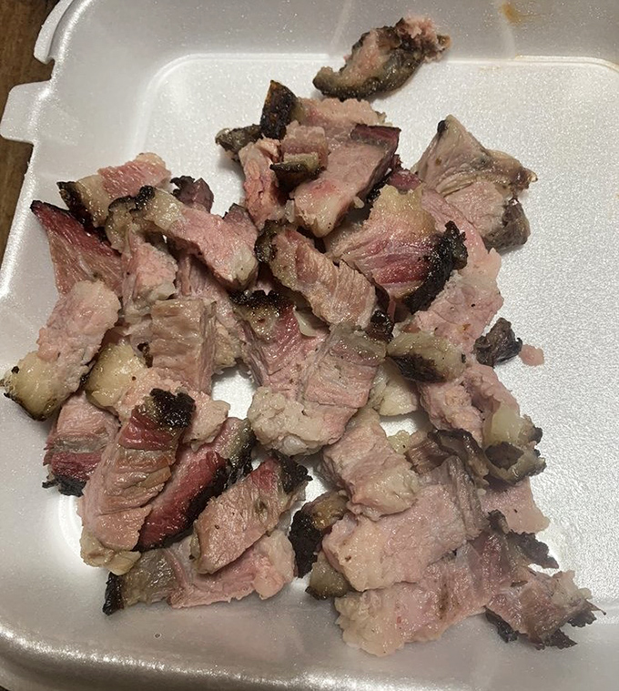 Brisket sliced to perfection - each piece a testament to the magic that happens when smoke, meat, and time enter a loving relationship.