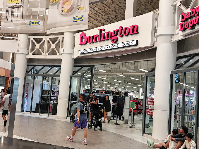 Burlington's entrance promises treasure hunting of the retail variety, where savvy shoppers know patience and persistence lead to wardrobe wins.