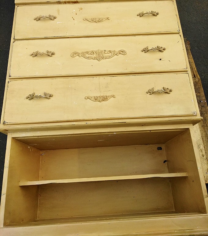 This vintage dresser whispers of upcycling potential. With some chalk paint and new hardware, it could star in a home makeover show.