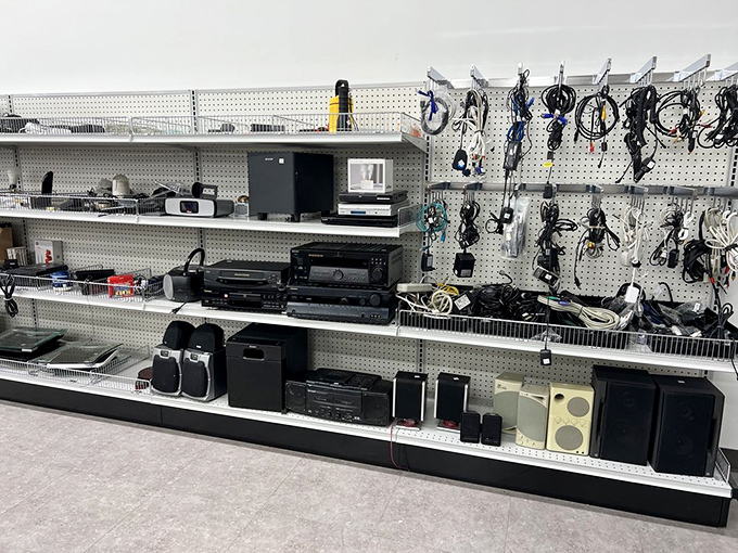 Audio equipment galore&mdash;where vintage stereo components and tangled cables promise musical resurrection for the technically inclined.