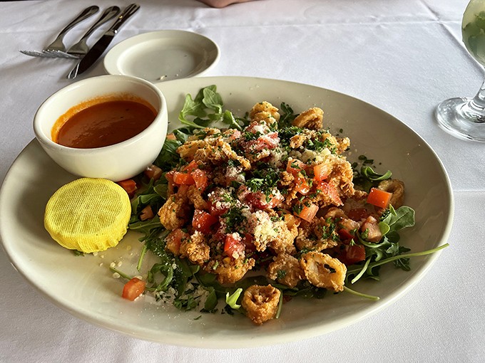 Calamari so perfectly fried it should give TED talks on achieving the ideal texture&mdash;crisp exterior, tender interior, zero rubber bands.