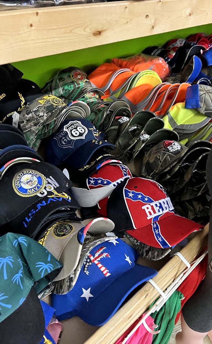 A sea of caps tells stories of allegiances—military service, sports teams, and road trips—each brim a billboard for personal history and regional pride.