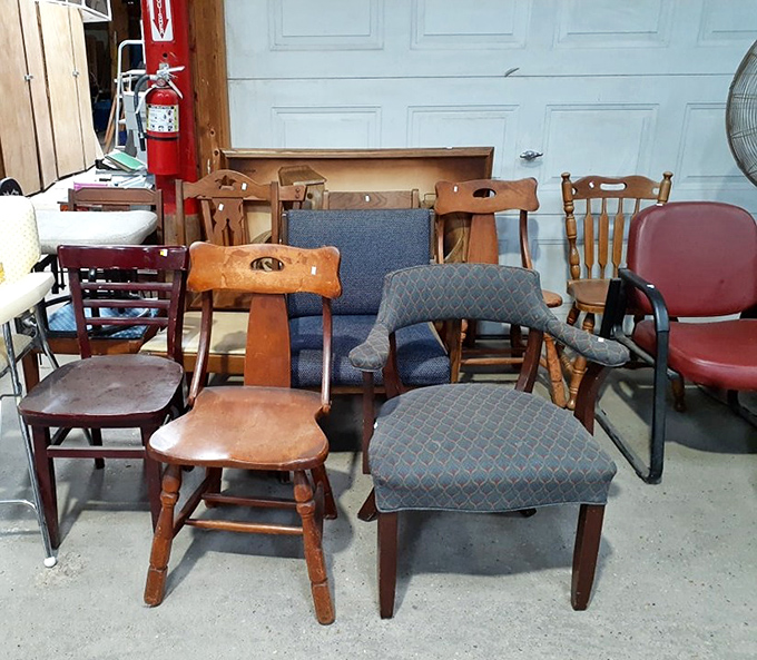 The chair gathering looks like a furniture family reunion&mdash;mid-century modern cousins mingling with country antique aunts and office chair uncles.