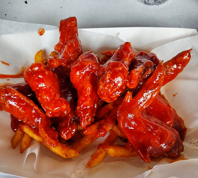 Wings so saucy and perfect, they almost steal the spotlight from their seafood co-stars. Almost.