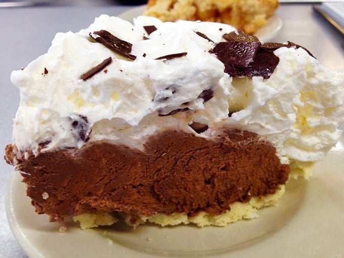 Chocolate cream pie topped with enough whipped cream to make you wonder why anyone bothered inventing stress in the first place.