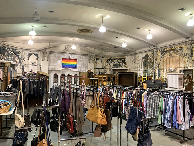 Handbags and jackets hang in patient formation, like contestants in a beauty pageant of pre-loved fashion waiting for their moment.