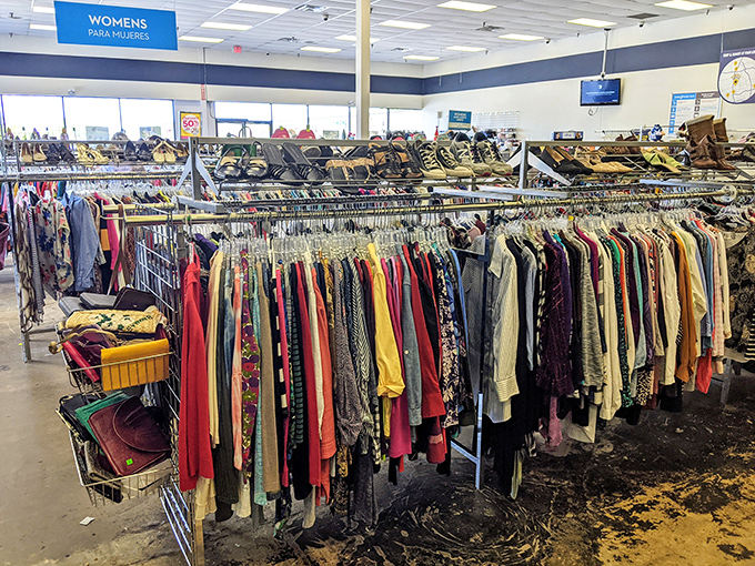 The women's section: a fashion democracy where designer labels and department store brands hang side by side in colorful harmony.